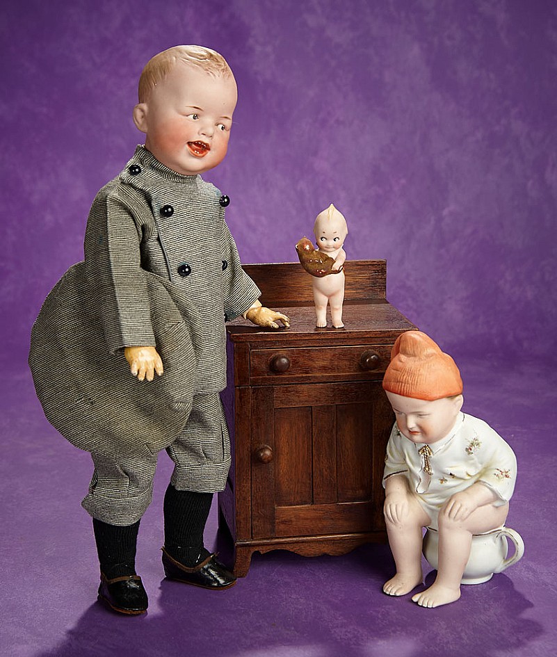 German All-Bisque Figure of Little Crying Child on Chamber Pot by Hertwig