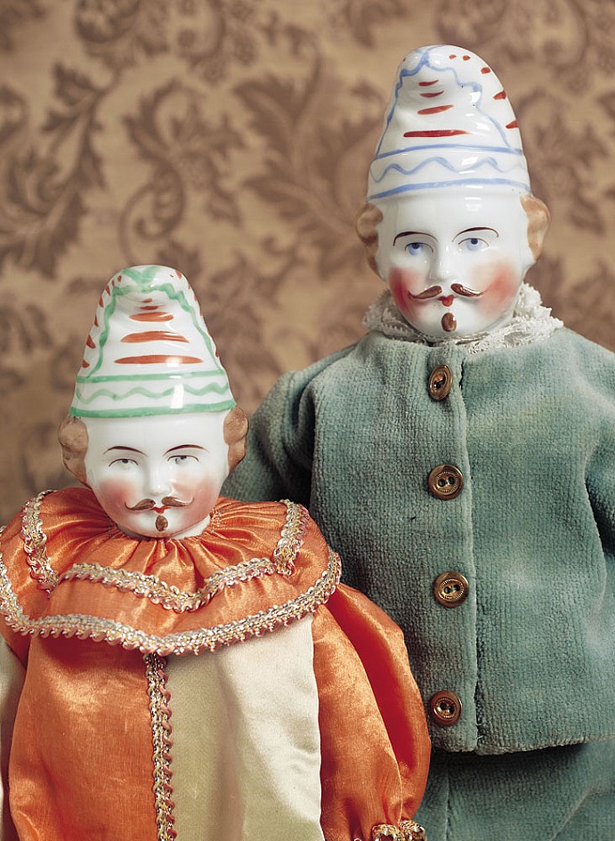 German Porcelain Doll as Jester with Green Trimmed Cap