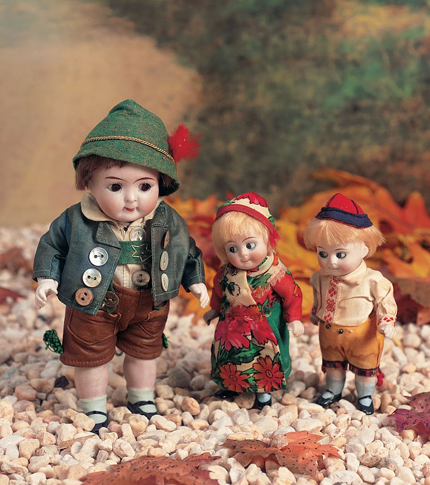 Pair, All-Bisque Googlies in Original Costumes