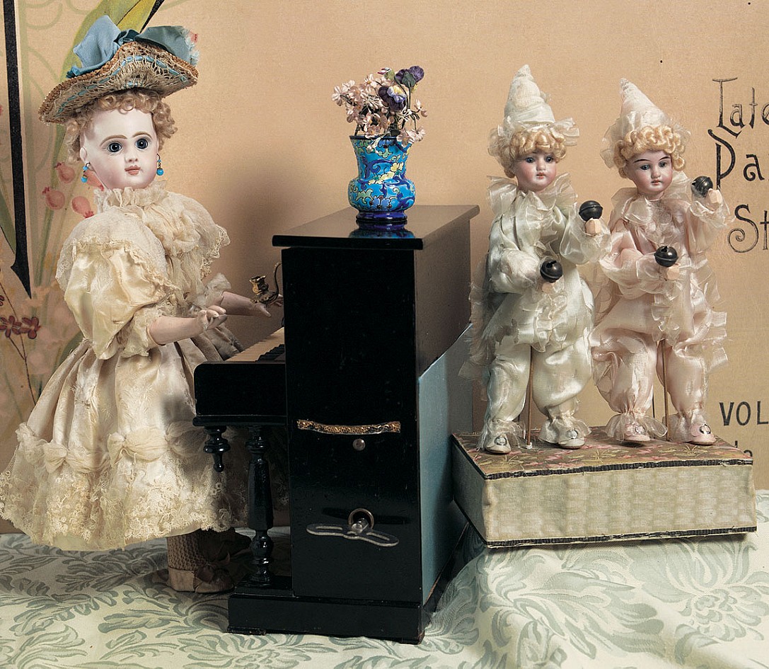 German Bisque Mechanical Bellows Dolls