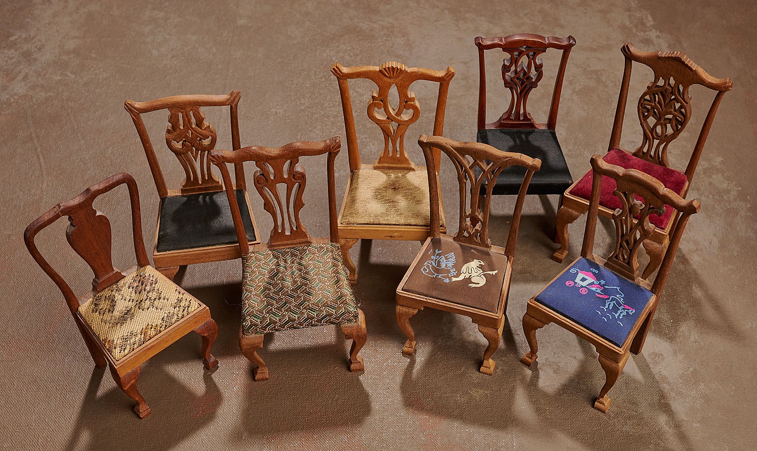 Eight Wooden Chippendale Style Miniature Chairs by George LeClerc