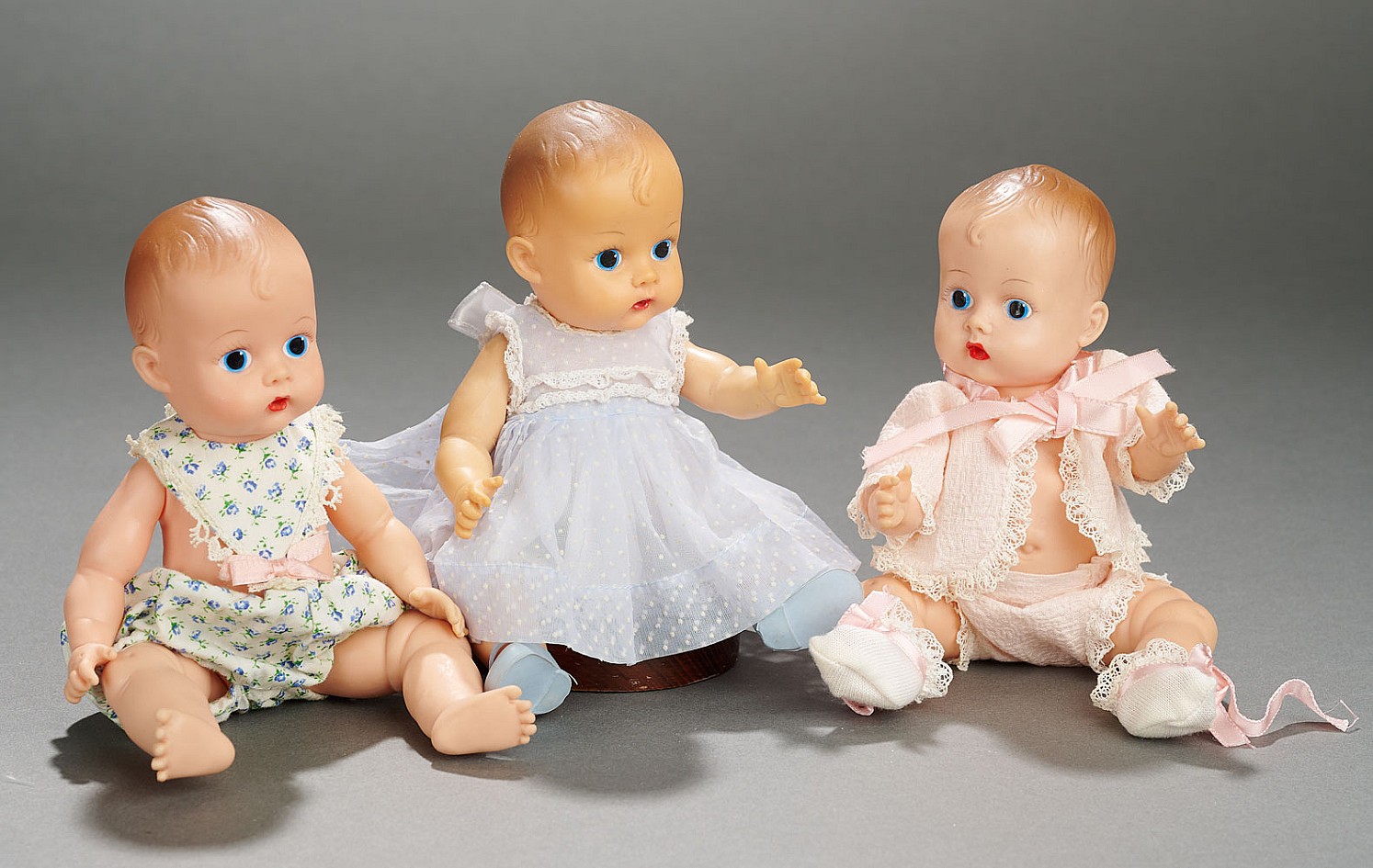 Three 8" Vinyl Painted Eye Ginnette Dolls by Vogue