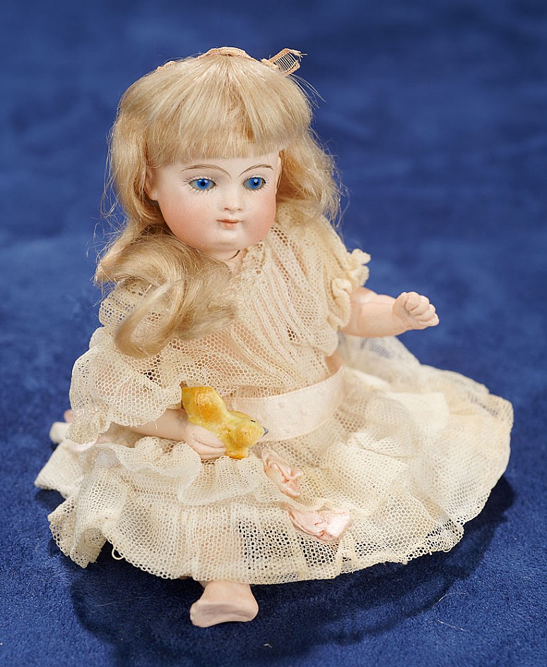 German All-Bisque Miniature Doll with Rare Sculpted Bisque Bird in Hand