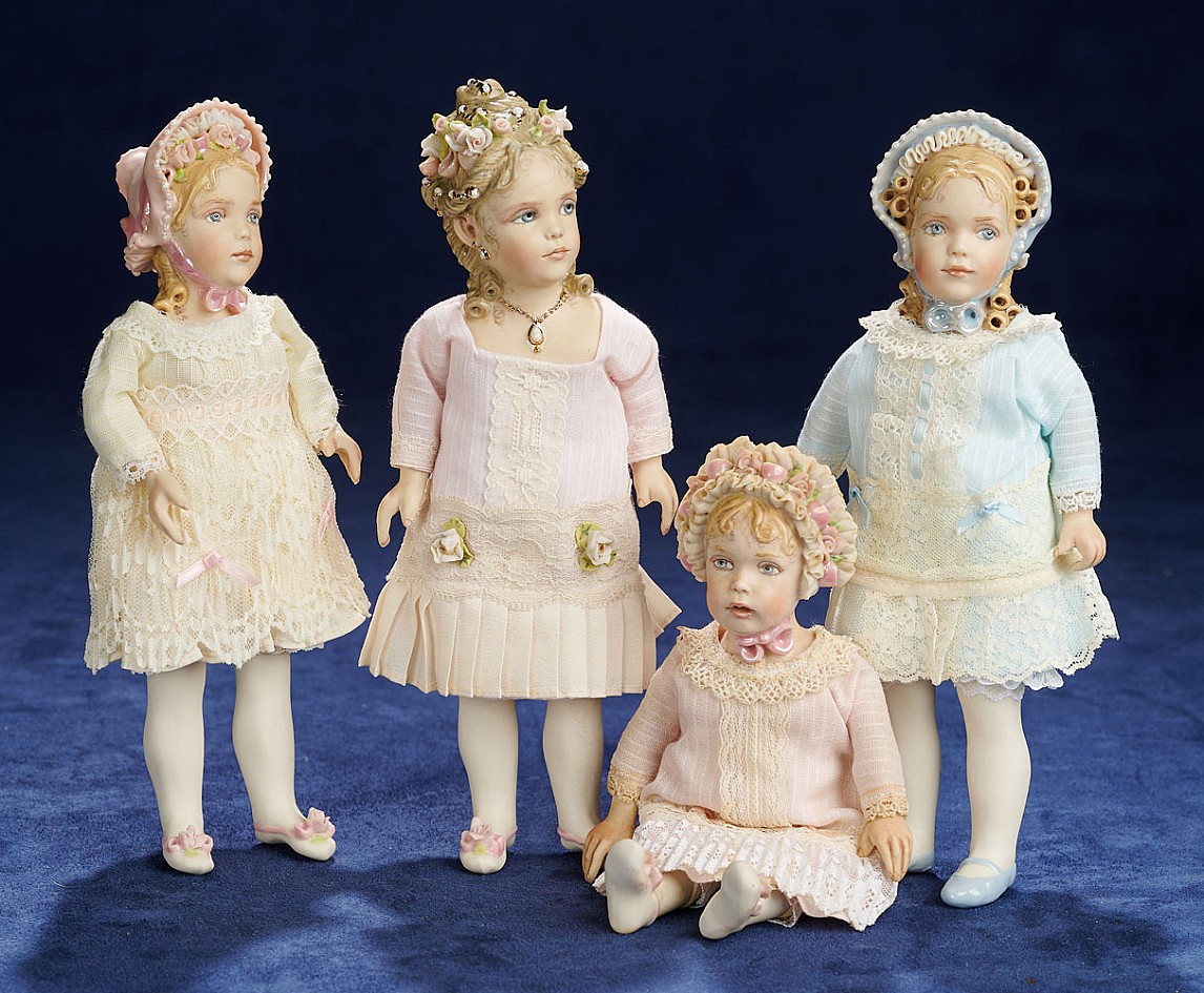 Four Miniature Porcelain Dolls with Sculpted Bonnets by Kathy Redmond