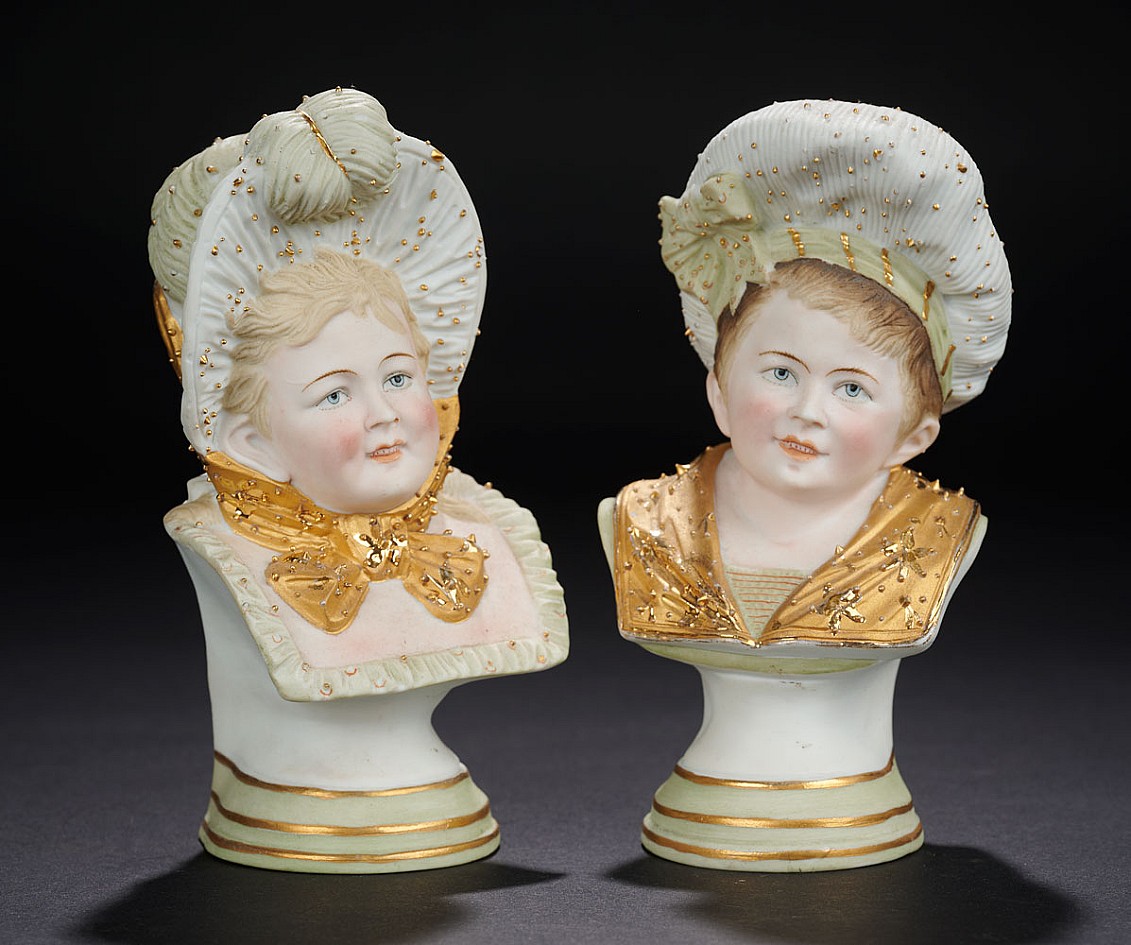 Pair, German Bisque Figures of Girl and Boy with Fancy Bonnets