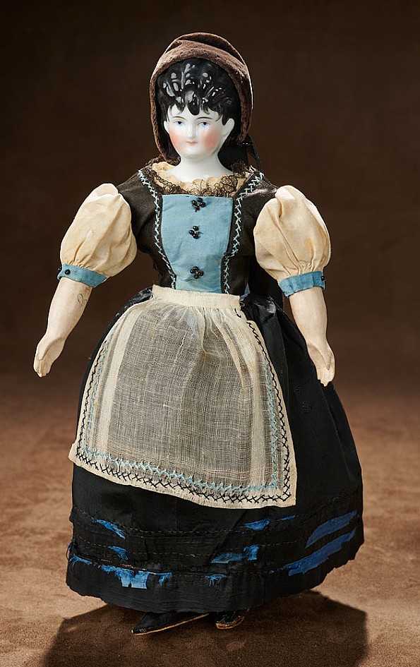 German Porcelain Doll with Forelock Curls and Traditional Costume